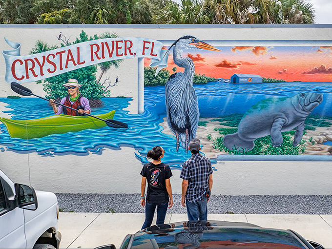 This mural captures Crystal River's essence better than any brochure—where wildlife, water, and humans coexist in a delicate dance of mutual admiration.