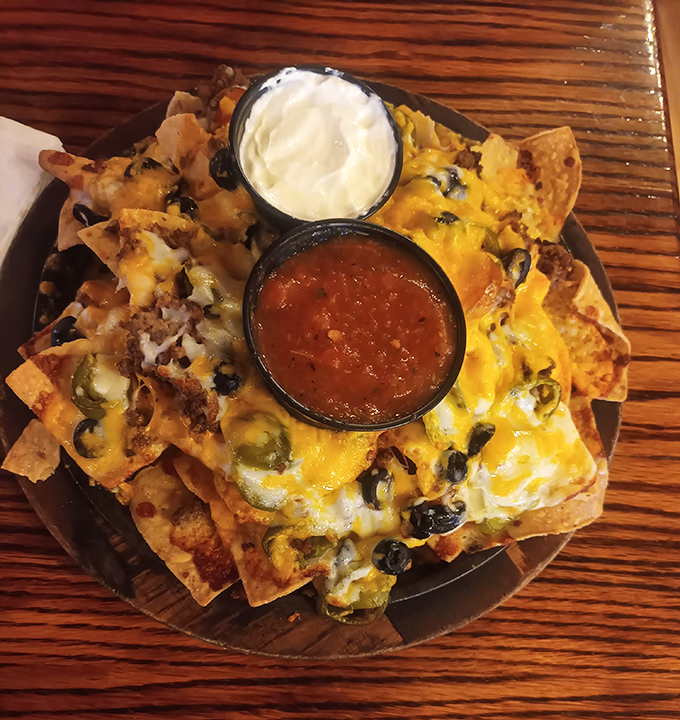 Nachos piled higher than your retirement portfolio should be, and twice as satisfying.