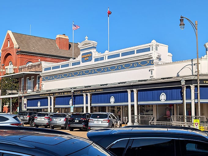 Neilson's Department Store stands as a testament to retail resilience, its classic blue awnings shading windows that have witnessed generations of Oxford shoppers.