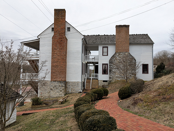 The Netherland Inn whispers stories of simpler times, when retirement planning meant having a good rocking chair and a sturdy porch.