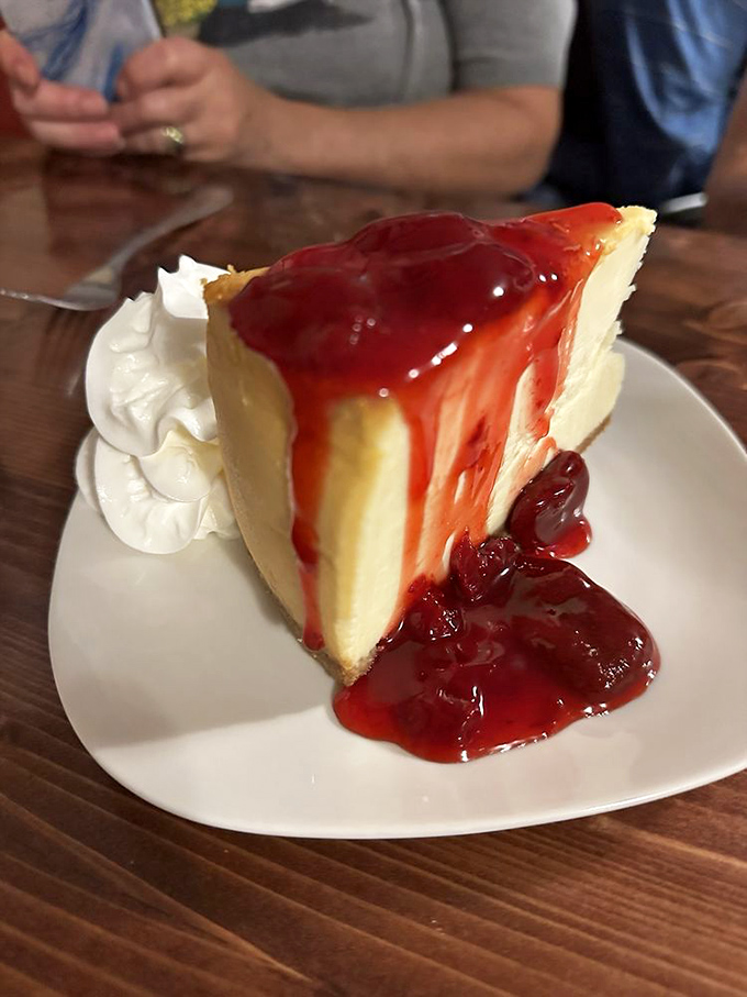 Cheesecake that strikes the perfect balance between dense and fluffy, crowned with a ruby cascade of berry sauce. Diet plans, beware!