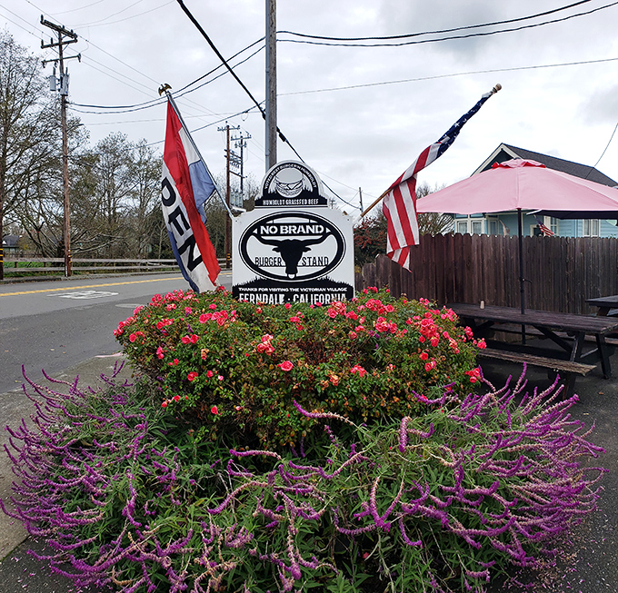 No Brand Burger Stand proudly announces its presence with flowers as colorful as its name is straightforward. Truth in advertising at its finest!