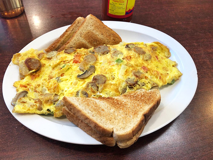 This isn't just an omelet&mdash;it's a fluffy yellow canvas painted with mushrooms and perfectly toasted bread standing guard on either side.