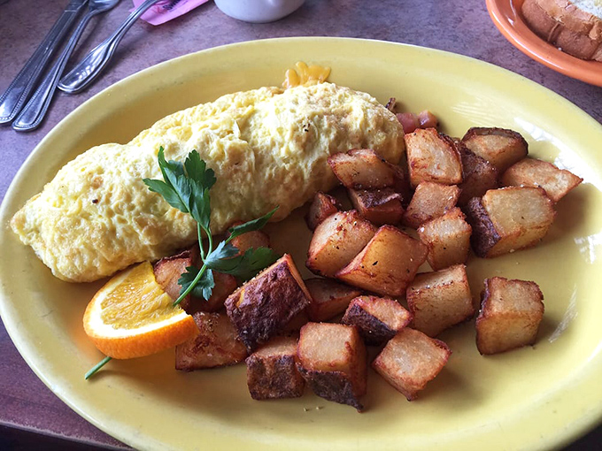 This omelet didn't just happen&mdash;it was engineered for maximum satisfaction. Those country potatoes are the unsung heroes of the plate.