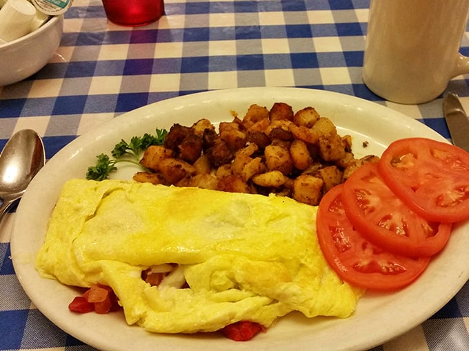 This omelet isn't just folded eggs&mdash;it's a golden envelope delivering a message of cheese, vegetables, and morning bliss directly to your soul.
