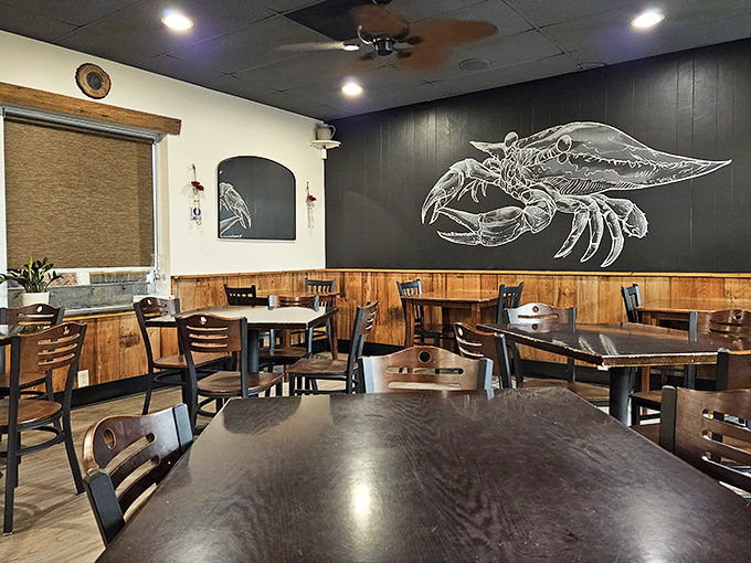 Coastal dining with artistic flair &ndash; that crab illustration isn't just decoration, it's practically a menu recommendation written on the wall.