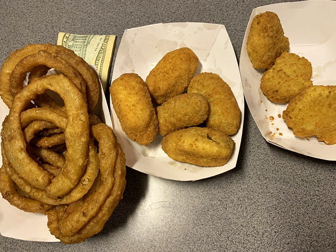 The holy trinity of fried goodness. These golden rings and bites aren't just sides&mdash;they're supporting actors deserving of their own standing ovation.