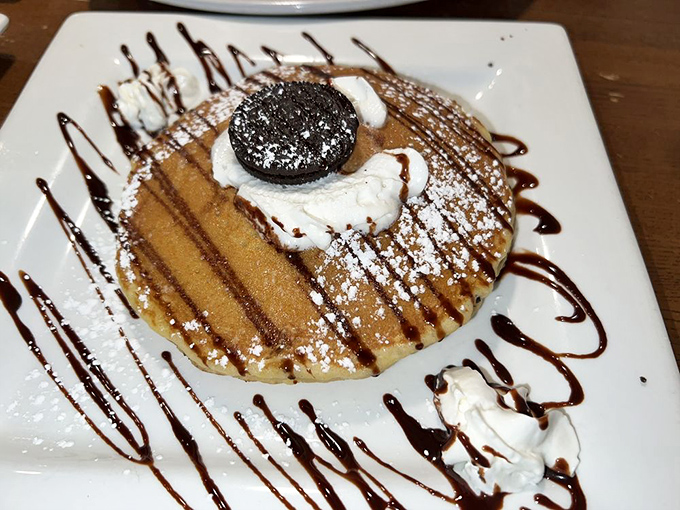 This pancake got dressed up fancy with chocolate drizzle and an Oreo crown, because sometimes breakfast needs to party too.