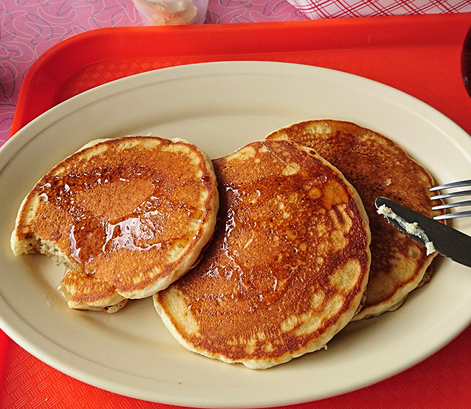 Pancakes so perfectly golden they could win medals. The kind that make you understand why breakfast deserves its "most important meal" status.