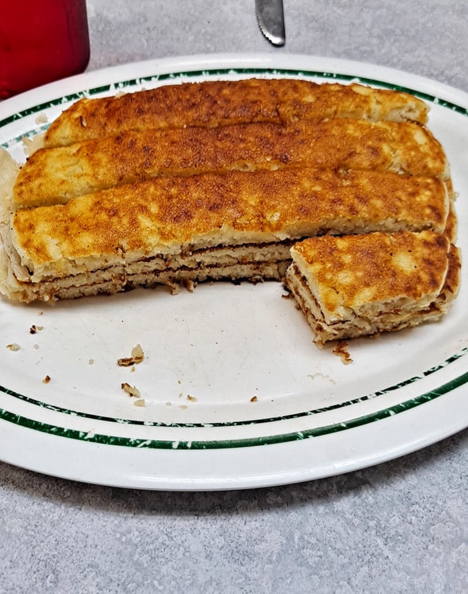 A pancake stack that makes you understand why people write songs about comfort food. Butter melting like a sunrise over fluffy golden horizons.