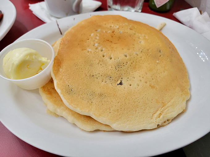 Pancakes that spread across the plate like golden lily pads, just begging for that butter to melt.