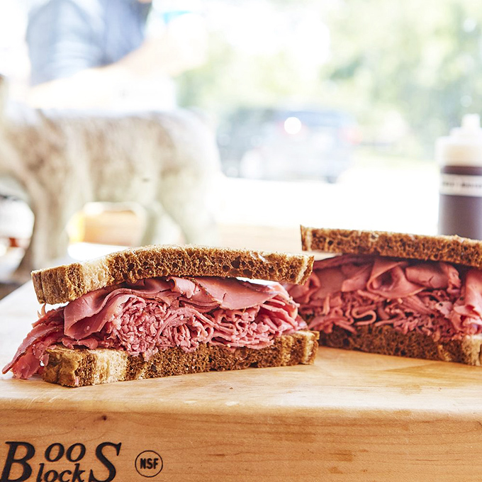 The Rolls-Royce of deli meats. This pastrami sandwich stacks thin-sliced, smoke-infused perfection between bread that knows it's just along for the spectacular ride.