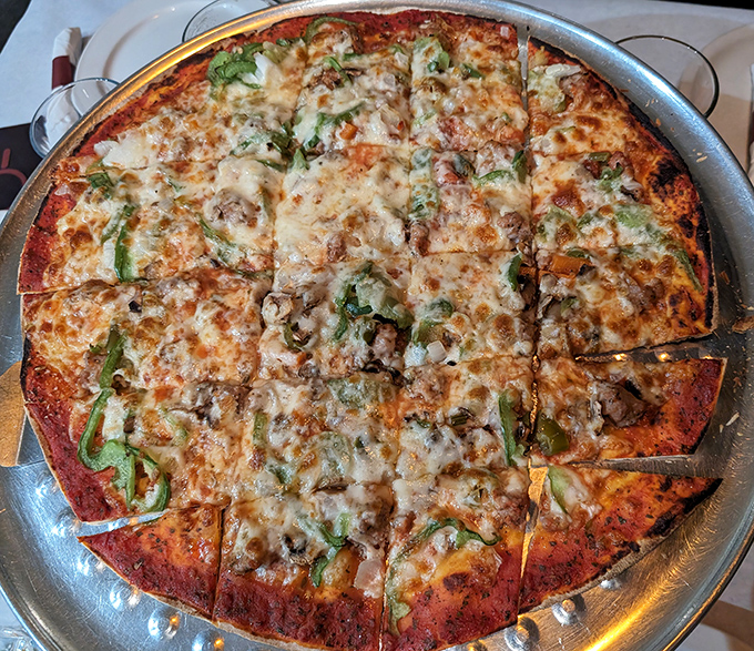 Pat's Special Pizza showcases the tavern-style thin crust Chicago locals actually eat, cut into squares that somehow make each piece taste better than the last.