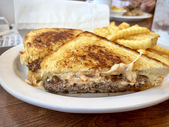 Patty melt perfection that would make your cardiologist wince and your taste buds sing. Worth every delicious calorie.