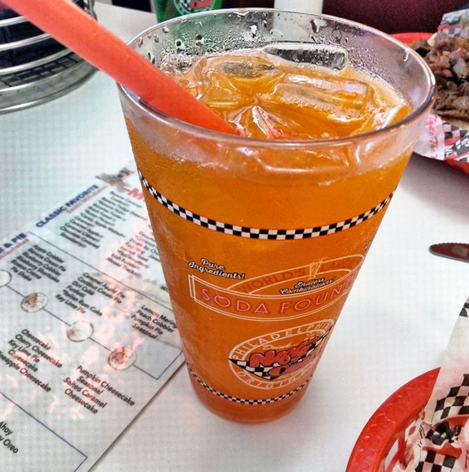 The soda fountain lives on! That checkerboard-rimmed glass of peachy-orange goodness takes "refreshing" back to when soda jerks were culinary artists.