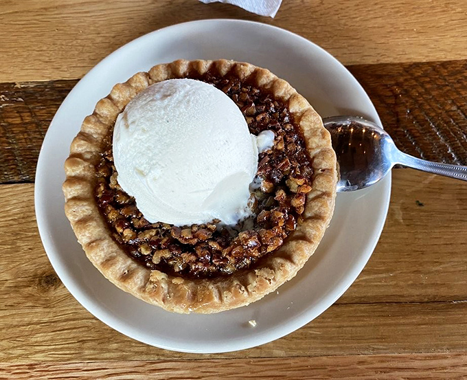 This pecan pie &agrave; la mode isn't just dessert; it's the sweet finale your taste buds have been patiently waiting for all evening.