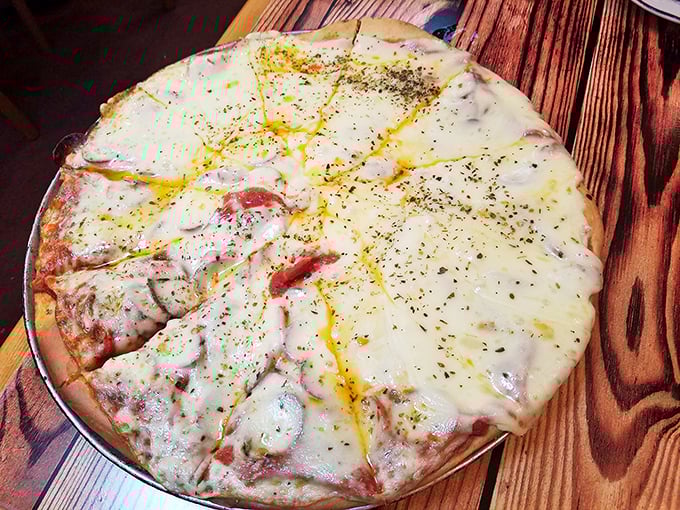 This isn't just cheese and pepperoni &ndash; it's an edible work of art with that distinctive golden-speckled top that's become Coccia House's signature style.