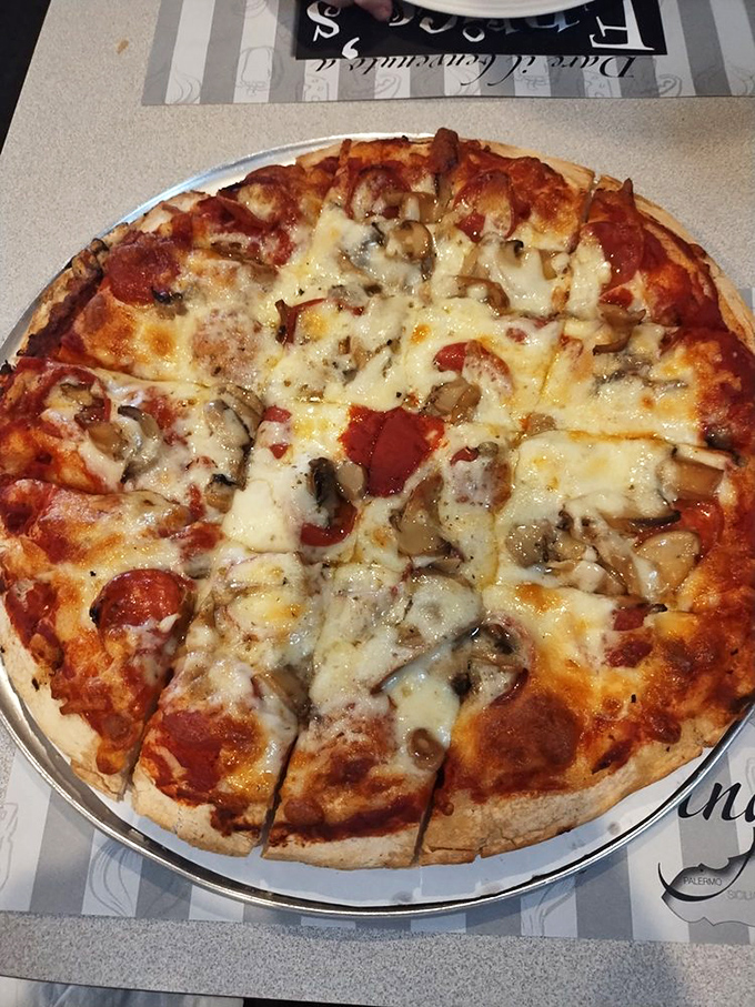 Half pepperoni, half mushroom perfection for those who refuse to compromise on their pizza preferences.