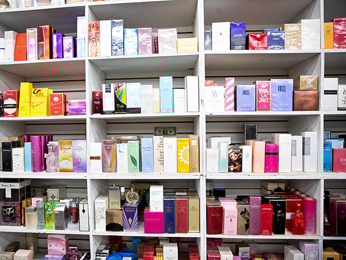 The perfume section: where your signature scent doesn't require signature loans. Designer fragrances lined up like soldiers ready for duty.