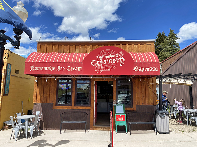 The Philipsburg Creamery's cherry-red awning signals what locals already know: life's too short not to stop for homemade ice cream in a historic mining town.