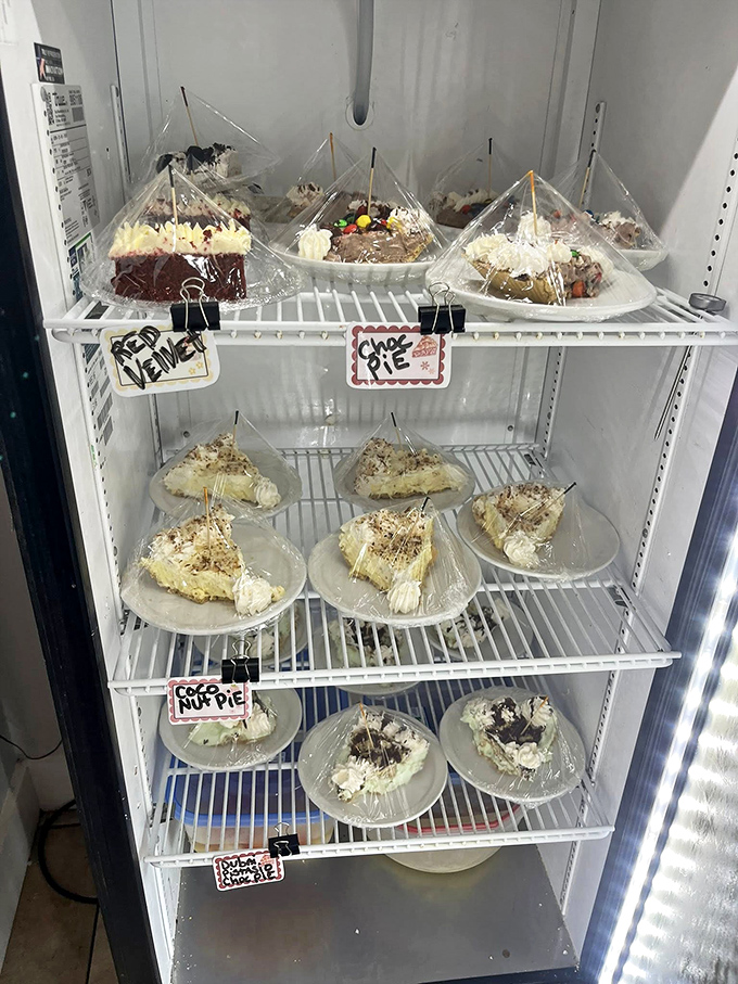 The dessert case&mdash;where willpower goes to die. These homemade pies aren't just served; they're presented as evidence that calories don't count on vacation.