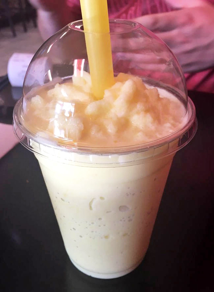 Their bubble tea looks like a tropical vacation in a cup. That thick straw is your passport to chewy tapioca pearl paradise.