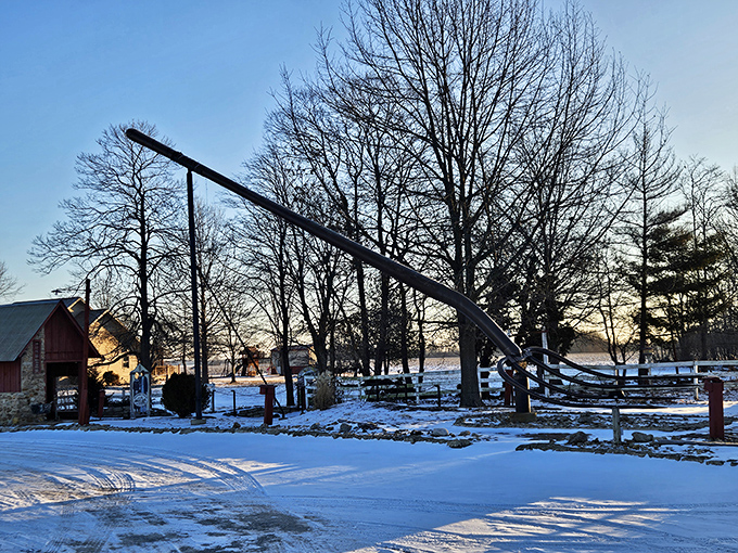 Winter transforms the World's Largest Pitchfork into something almost magical, with snow dusting the landscape and highlighting its impressive scale.