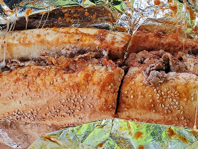 The pizza steak—where two Philadelphia icons merge into one glorious sandwich. It's like Rocky and the Liberty Bell had a delicious baby.