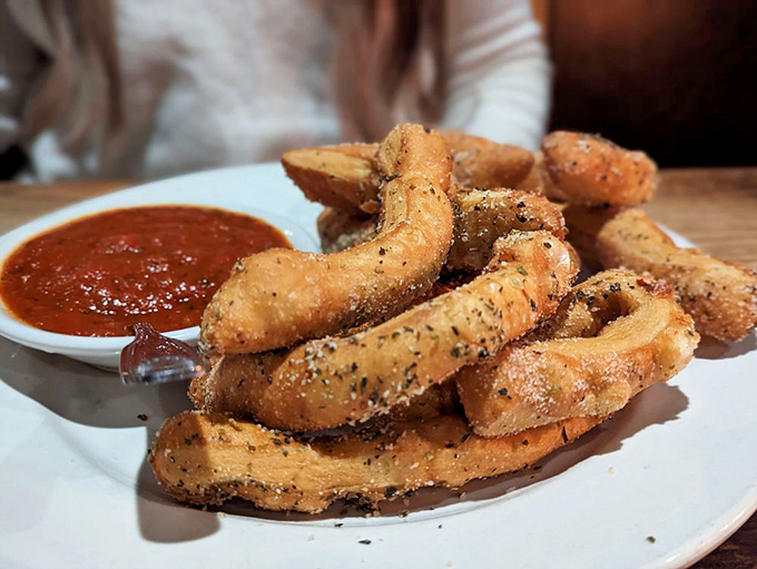 8. pizza friesCrispy, seasoned pizza fries prove that not all Italian innovations require a passport – just a healthy appetite and napkins.