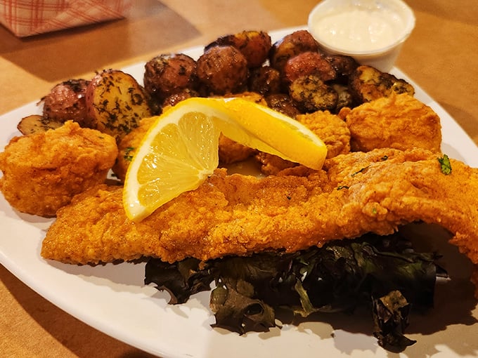 Golden-fried fish, seasoned potatoes, and a splash of green&mdash;a plate that whispers "vacation" even on a Tuesday.