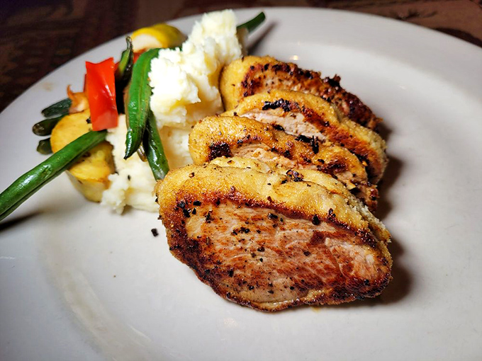 Perfectly seared pork tenderloin medallions arranged like a culinary clock of deliciousness, counting down to your next bite.