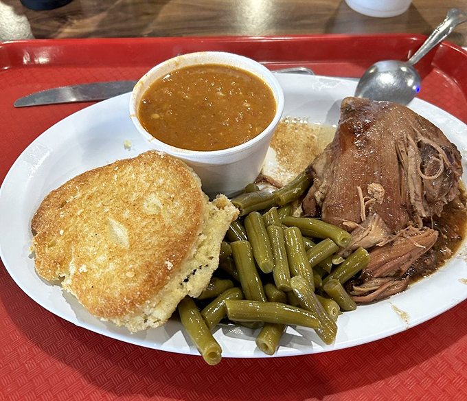 That cornbread paired with tender meat and green beans represents Southern cooking at its honest, unpretentious best &ndash; pure soul food.