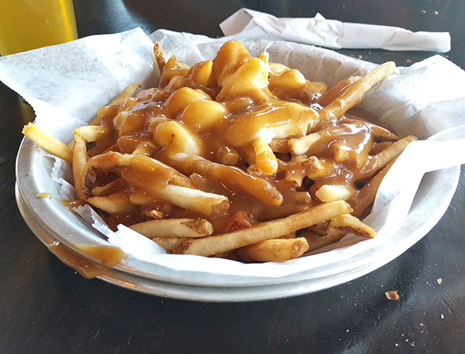 Poutine that would make a Canadian shed a patriotic tear&mdash;crispy fries swimming in gravy and cheese curds that melt with each passing second. 
