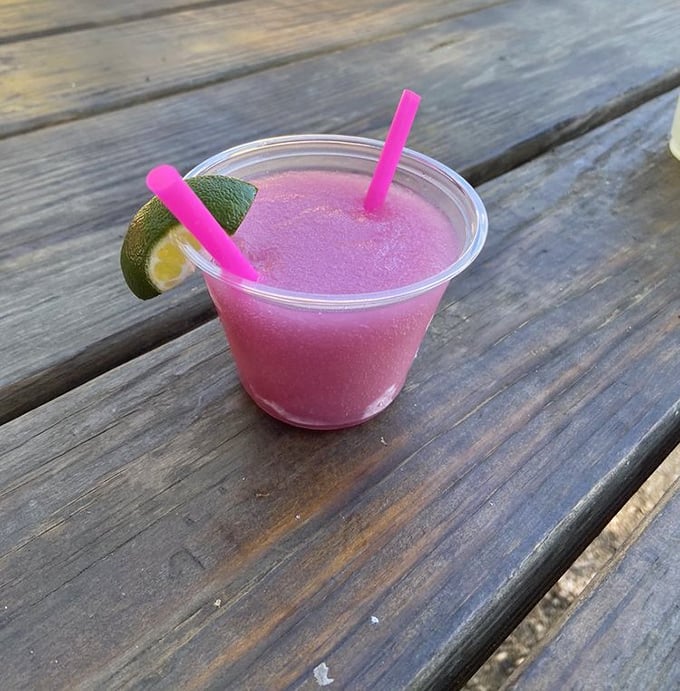 A prickly pear margarita that tastes like Texas sunshine in liquid form. The pink hue isn't just pretty&mdash;it's practically medicinal after all that meat.