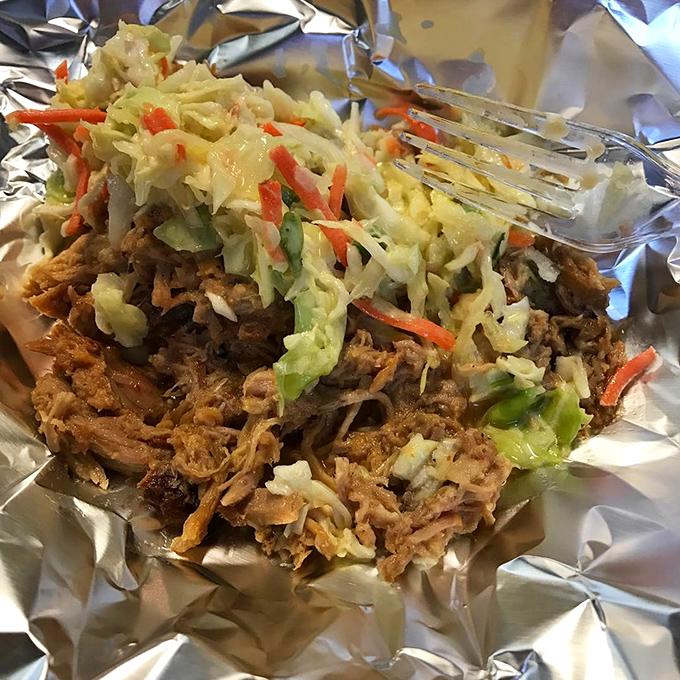 The perfect marriage &ndash; tender pulled pork crowned with crisp, colorful slaw creates a textural symphony that makes your taste buds stand up and applaud.