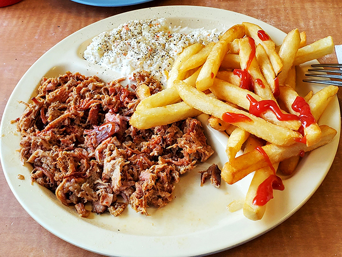 Pulled pork that doesn't need a fancy smoke ring to prove itself—just tender, flavorful meat that speaks the language of Southern comfort.