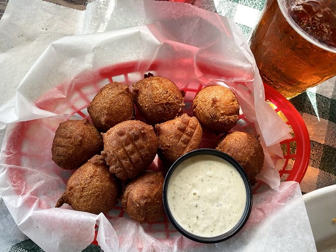 Hush puppies so perfectly golden and crispy, they're worth driving across state lines for. The dipping sauce is practically drinkable.