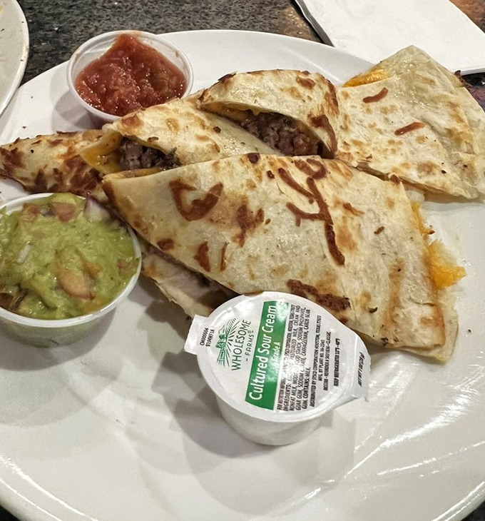 A quesadilla that bridges cultures: Mexican inspiration meets Jersey execution, with guacamole that's actually the proper shade of green.