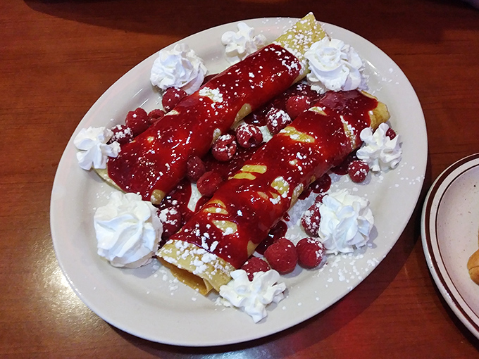 Dessert or breakfast? Yes. These raspberry blintzes are what would happen if a crepe and cheesecake had a beautiful baby and dressed it in berry couture.