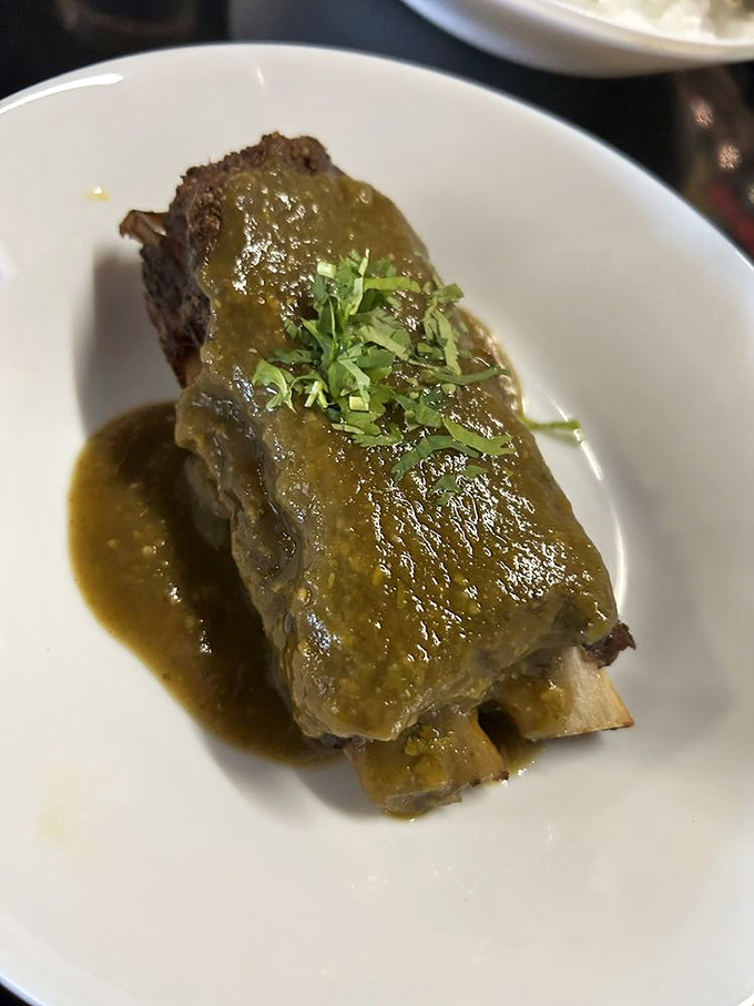 Ribs bathed in verde sauce that makes you question why you ever settled for ordinary barbecue in the first place.