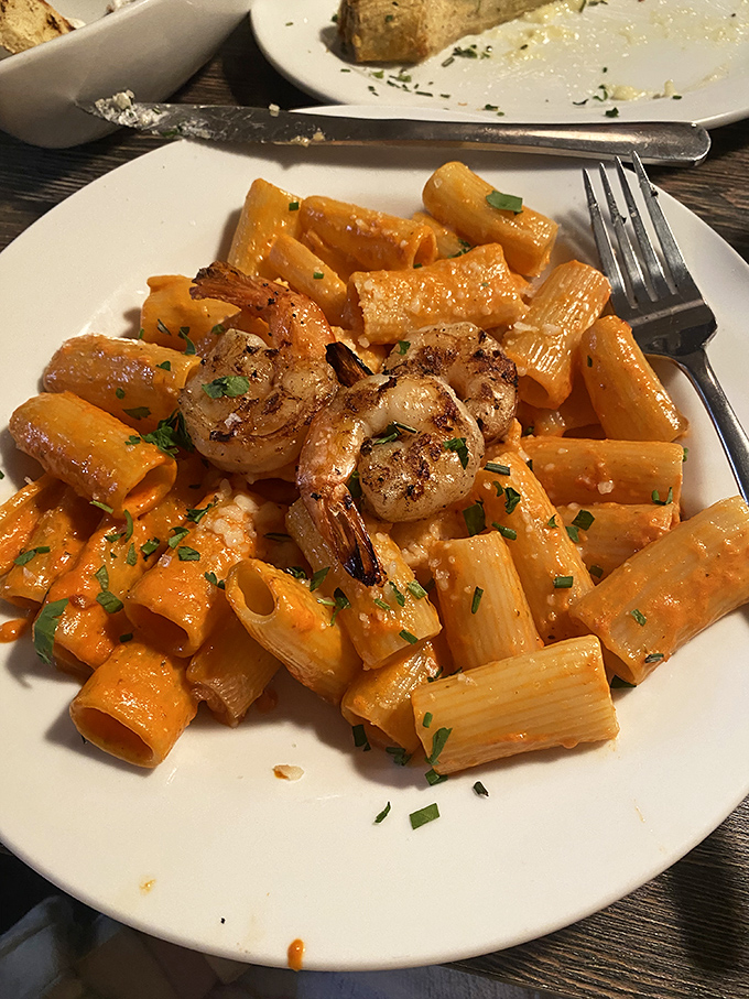 Rigatoni that's found its soulmate in a vibrant sauce. Those ridges aren't just for show &ndash; they're sauce-collecting architectural marvels.