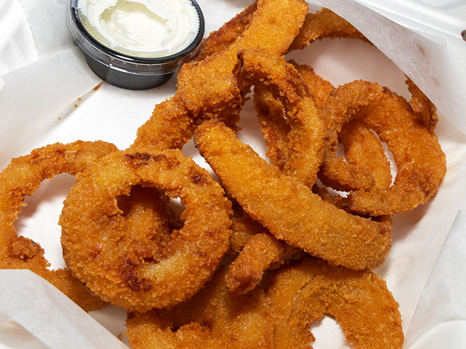 Even the onion rings deserve their moment of glory&mdash;perfectly breaded circles of sweetness that crunch loud enough for neighboring tables to notice.