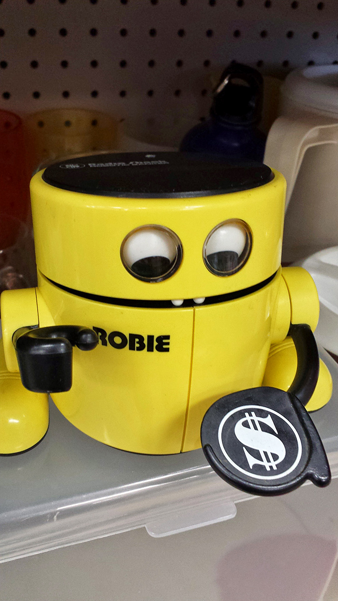 Meet "Robie" &ndash; the vintage coin bank with googly eyes who's ready to guard your spare change with adorable determination.