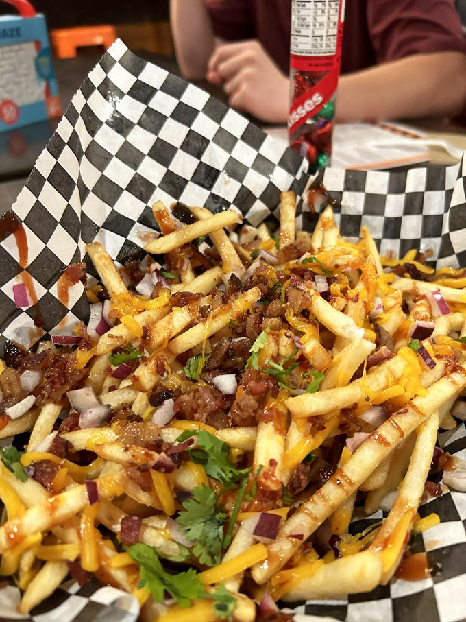 These loaded fries are what would happen if a chili cheese dog and French fries had a beautiful baby&mdash;topped with meat, cheese, onions, and herbs for maximum flavor impact.