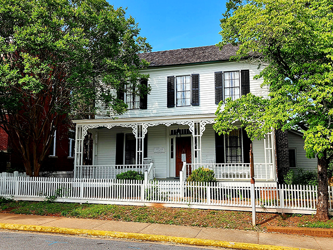 That white picket fence is working overtime to maintain every Hallmark movie stereotype, bless its heart.
