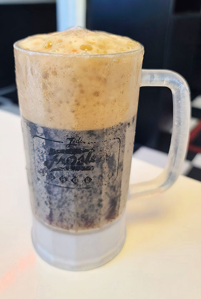 The root beer float—where carbonation meets creamy vanilla in a frosty mug romance that's been making people smile since poodle skirts were cool.