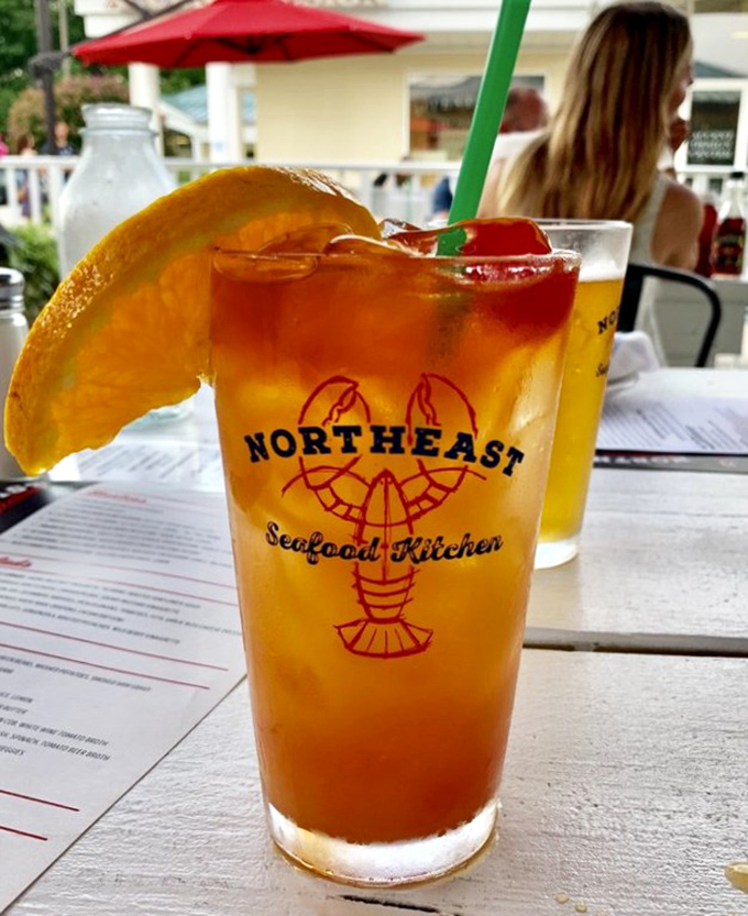 Their signature rum punch, adorned with fresh orange and cherry, promises vacation vibes with every sip. Liquid sunshine in a logo glass.