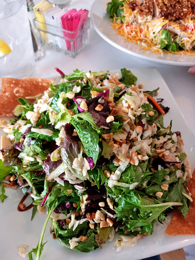 A salad that actually excites&mdash;crisp greens, crunchy nuts, and enough interesting bits to make you forget you're eating something healthy.
