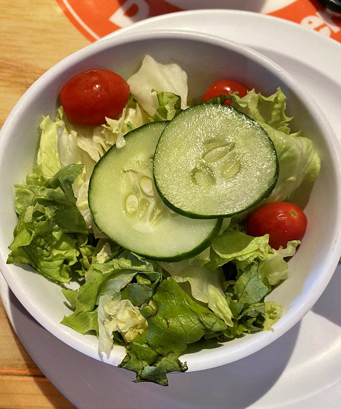 A side salad that didn't get the memo about being an afterthought. Fresh, crisp, and actually worth eating&mdash;not just pushing around your plate.