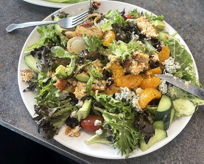 A salad that doesn't apologize for being healthy&mdash;it's too busy showing off with fresh greens, mandarin oranges, and crumbled cheese.
